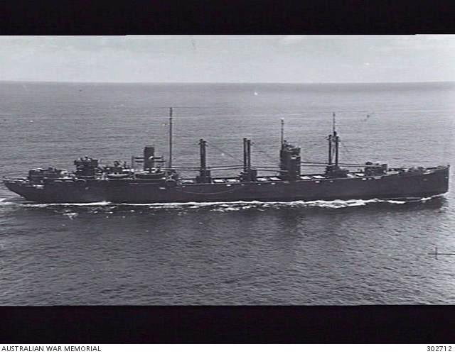 1943-12-12. AERIAL STARBOARD SIDE VIEW OF THE AMMUNITION SHIP USS PYRO ...