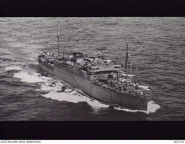 1943-09-17. AERIAL STARBOARD BOW VIEW OF THE TRANSPORT USS ROCHAMBEAU ...
