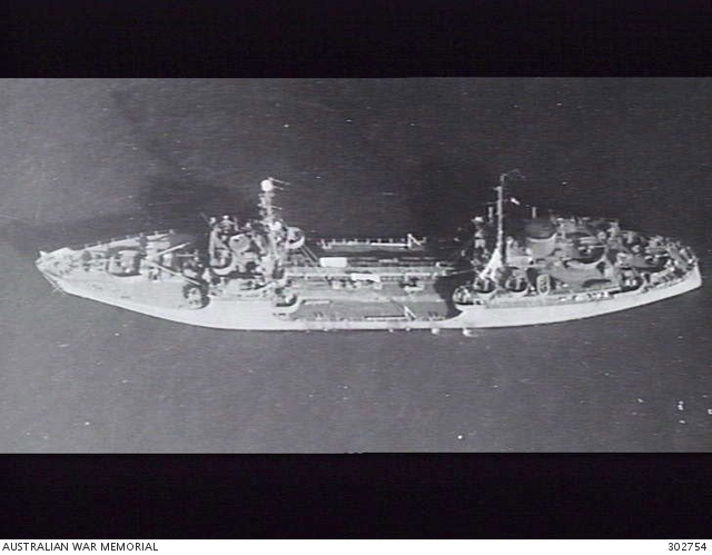 1943-09-30. AERIAL PORT SIDE VIEW OF THE GASOLINE TANKER USS ...