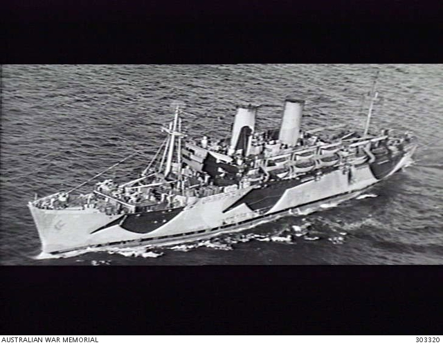 1944-06-21. AERIAL PORT BOW VIEW OF THE AMERICAN TRANSPORT GENERAL ...