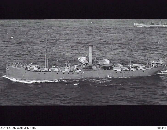 1943-05-05. AERIAL PORT SIDE VIEW OF THE CARGO VESSEL SS KOTOR. THE ...