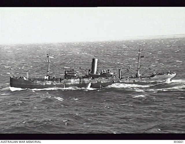 1941-07-28. AERIAL PORT SIDE VIEW OF THE BRITISH CARGO VESSEL SS MUNDRA ...