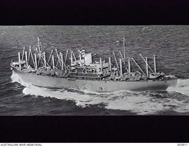 1944-04-07. AERIAL PORT QUARTER VIEW OF THE AMERICAN CARGO VESSEL SEA ...