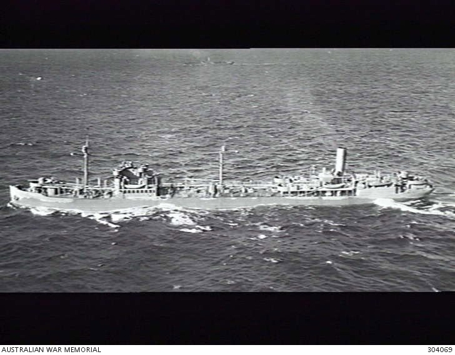1943-07-19. AERIAL PORT SIDE VIEW OF THE AMERICAN TANKER TRINITY WHICH ...