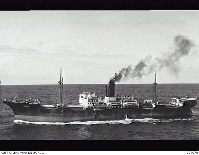 AERIAL PORT SIDE VIEW OF THE BRITISH CARGO VESSEL TRIONA WHICH ESCAPED ...