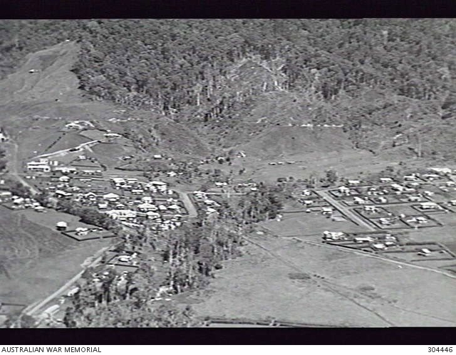 WAU, NEW GUINEA. AERIAL VIEW OF THE TOWN PRIOR TO WORLD WAR 2. (NAVAL ...