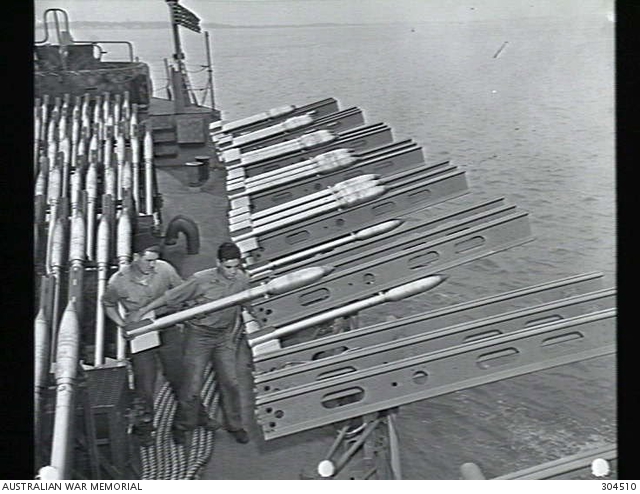 C.1944. ABOARD A LANDING SHIP MEDIUM (ROCKET) OF THE US NAVY 5 INCH FIN ...
