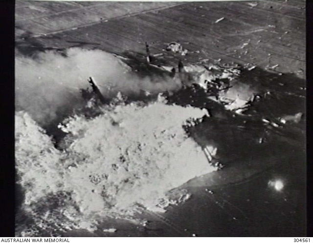 PACIFIC OCEAN. 1945-01-21. BURNING WRECKAGE OF AN EASTERN AIRCRAFT TBM ...