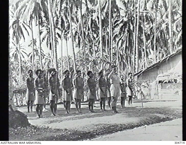 GUADALCANAL, BRITISH SOLOMON ISLANDS PROTECTORATE. 1944-01-25.A GUARD ...