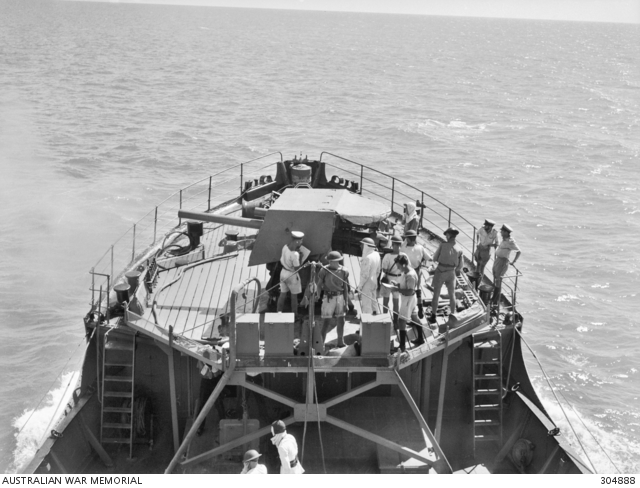 C.1943. PRACTICE FIRING WITH THE 4 INCH GUN ABOARD THE AUXILIARY ANTI ...