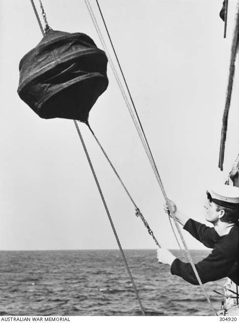 OFF BRISBANE, QLD. THE DAY'S SWEEP COMPLETED, THE SIGNAL BALL USED TO ...