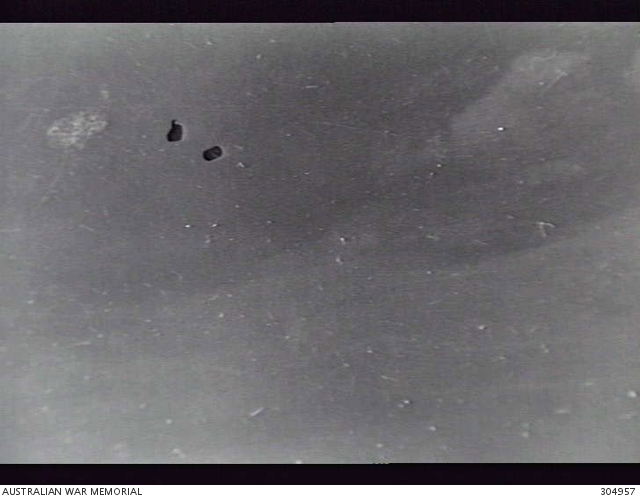 DARWIN, NT. 1942-02-19. DEPTH CHARGES JETTISONED FROM THE CORVETTE HMAS ...