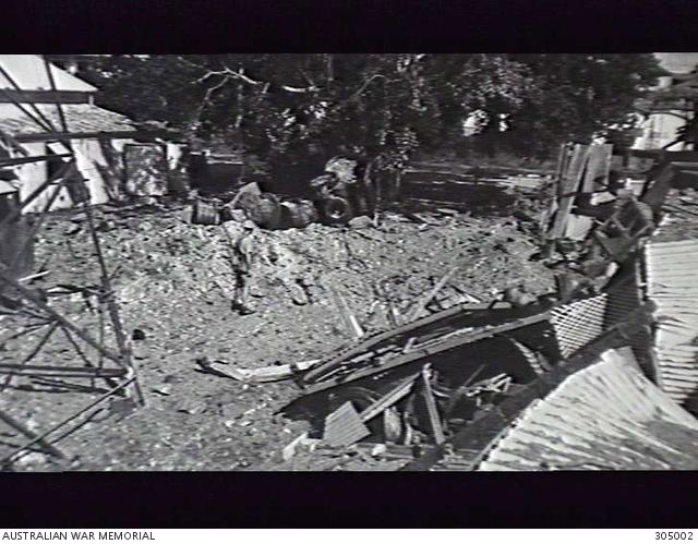 DARWIN, NT. C.1942-02-20. POST MASTER GENERAL'S STORE, DAMAGED BY THE ...