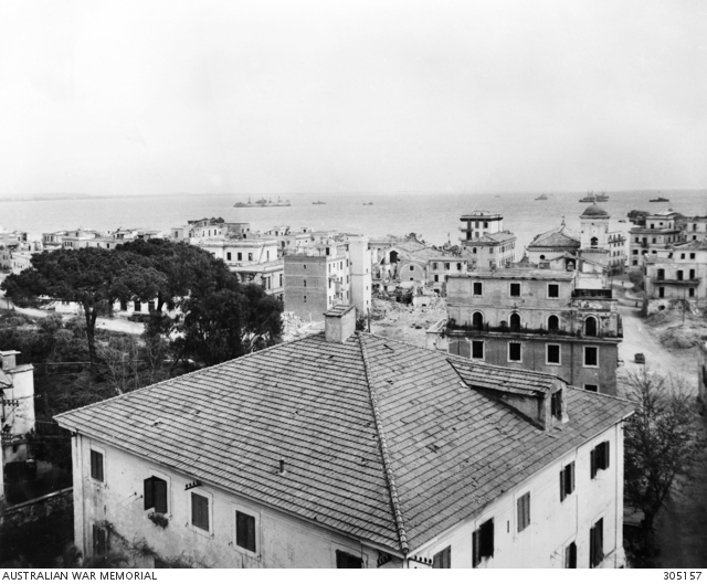 ANZIO, ITALY. 1944. THE BEACHHEAD SHOWING DAMAGE TO BUILDINGS IN THE ...