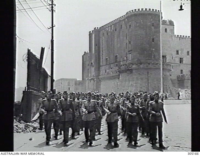 NAPLES, ITALY. 1944. BRAZILIAN TROOPS MARCH ALONG A STREET IN NAPLES ...