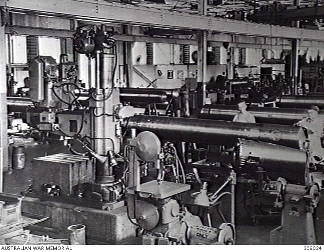 NORTH SYDNEY, NSW. C.1950. MACHINERY AND TORPEDOES ON THE FLOOR OF THE ...