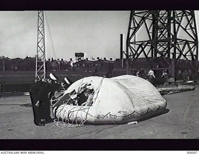 BARROW-ON-FURNESS, ENGLAND. 1955. AN INFLATED RUBBER LIFE RAFT BEING ...