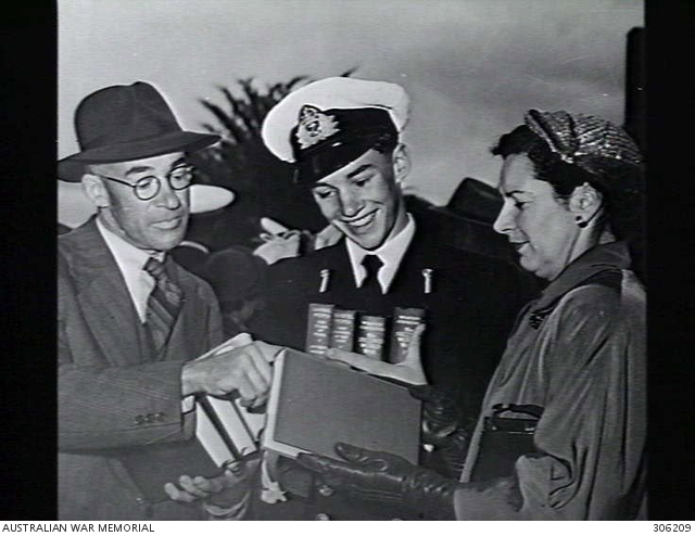 HMAS CERBERUS, FLINDERS NAVAL DEPOT, VIC. C.1955. A CADET MIDSHIPMAN ...