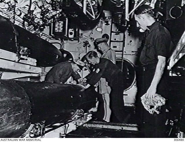 ADJUSTMENTS BEING MADE TO A MARK VIII 21 INCH TORPEDO IN A BRITISH ...