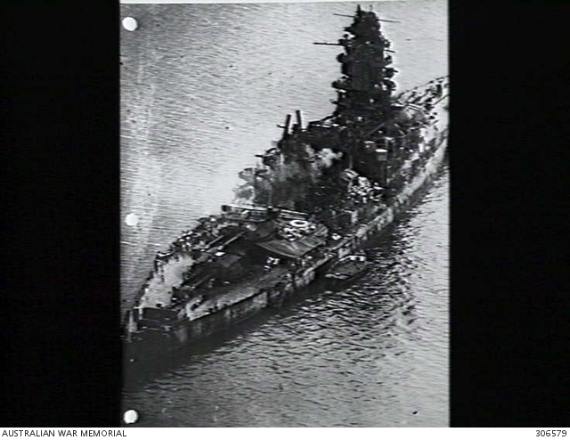 YOKOSUKA, TOKYO, JAPAN. 1945-08-25. AERIAL STARBOARD QUARTER VIEW OF ...