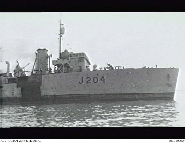 DARWIN, NT. 1942-01-25. STARBOARD SIDE VIEW OF DAMAGE SUSTAINED BY THE ...