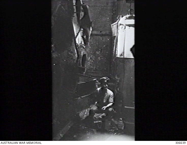 DARWIN, NT. 1942-01-25. DETAIL INTERIOR VIEW OF DAMAGE SUSTAINED BY THE ...