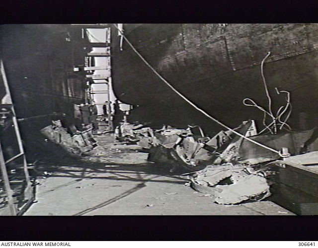 DARWIN, NT. 1942-01-25. DAMAGED PLATES FROM THE CORVETTE HMAS KATOOMBA ...