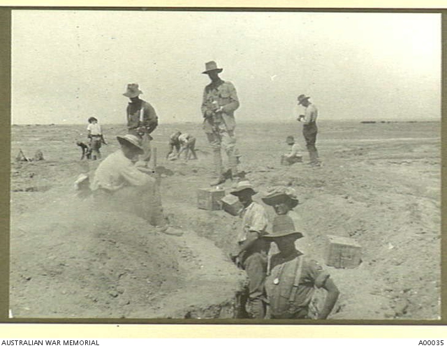 A group of unidentified Australian light horse men digging trenches on ...