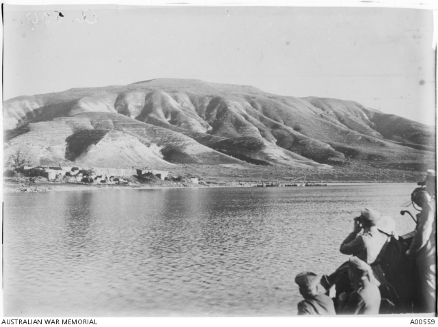 Soldiers looking across Lake Genesareth to a fishing village at the ...