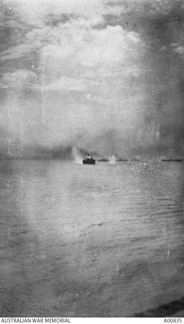 Turkish shells fired from Chanak exploding close by Allied transport ...
