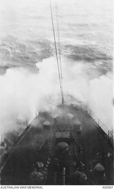 View of the sea crashing over the bow of HMAS Sydney in the North Sea ...