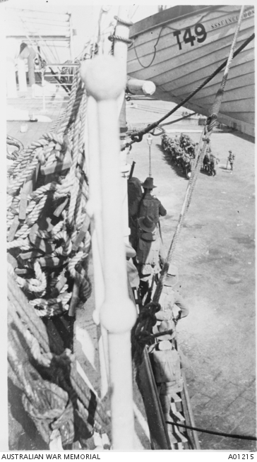 Troops of the 14th Battalion embarking on HMAT Seang Choon at ...