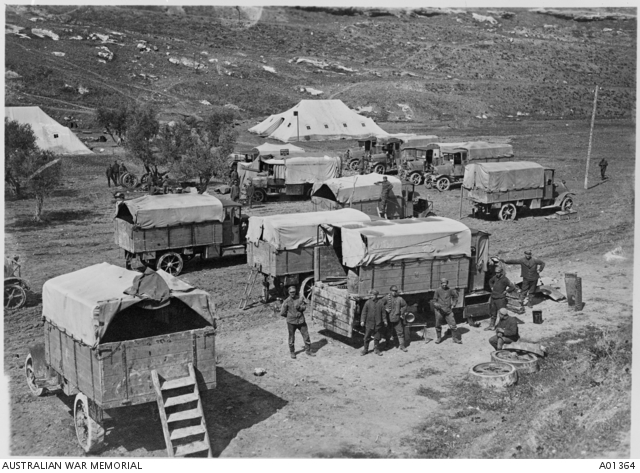 A German motor repair works camp, showing several trucks and two tents ...