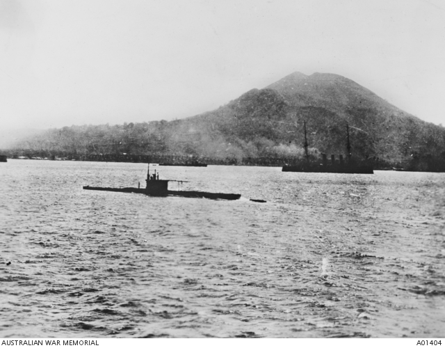 The Australian submarine HMAS AE2 entering Rabaul Harbour. Two ships ...