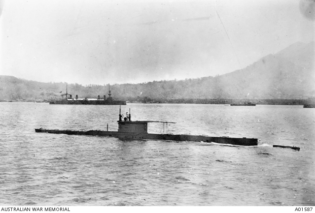 The Australian submarine AE2 in Rabaul Harbour. Two other ships are ...