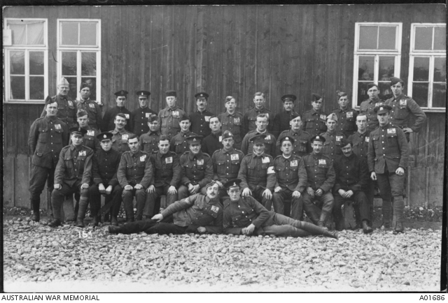 Group portrait of unidentified English and Australian Prisoners of War ...