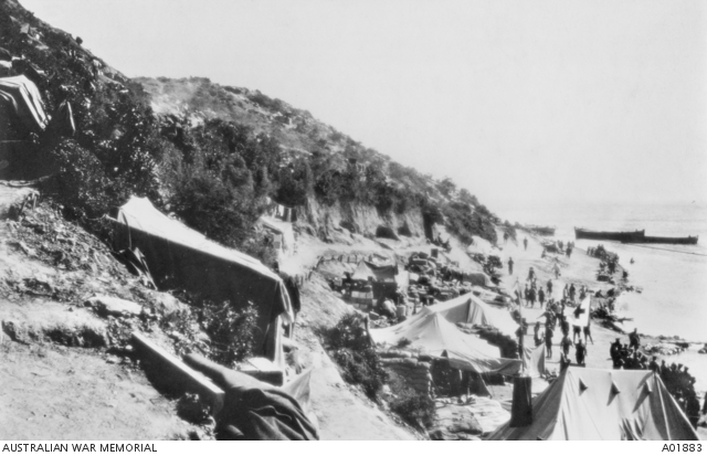 Casualty Clearing Station on Anzac Beach. Troops are seen walking along ...