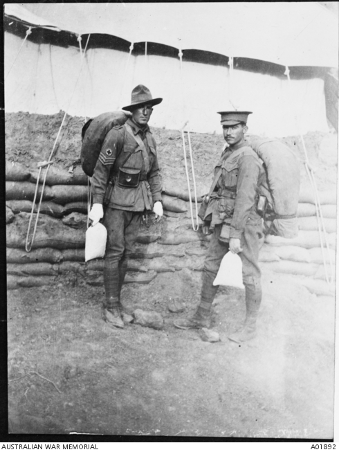 Sergeant Mitchell with hands bandaged and Sergeant Pascall of the ...