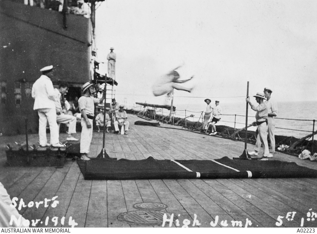 Men competing for the five foot one inch high jump during a sports ...