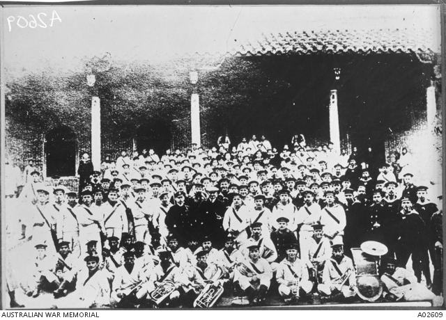 Portrait of the full crew of the German raider SMS Emden. Note the band ...