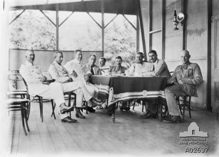 An informal group portrait of, from left to right: Lieutenant K Carlile ...
