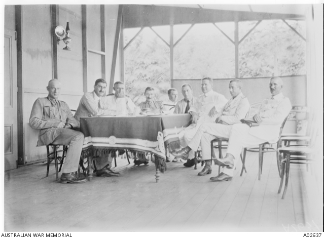 An informal group portrait of, from left to right: Lieutenant K Carlile ...