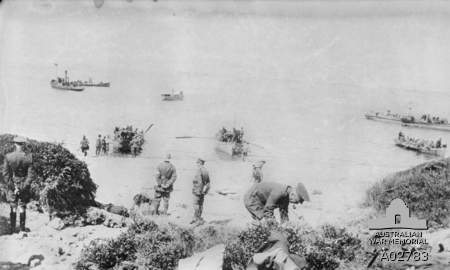 Troops landing at Anzac Beach. The men in the foreground are members of ...