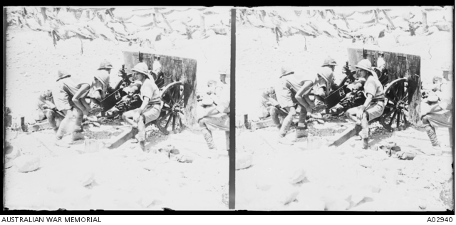 Members of the 11th Mountain Battery in action using a light field 3.7 ...