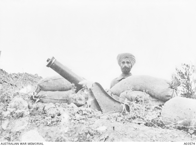 A Japanese 75mm mortar being manned by a Sikh orderly. Four of these ...