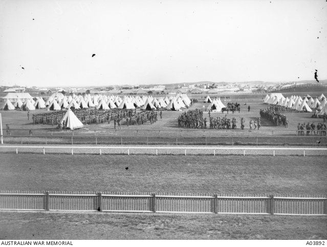 Troops on parade at a camp at a race course, probably Randwick, near ...