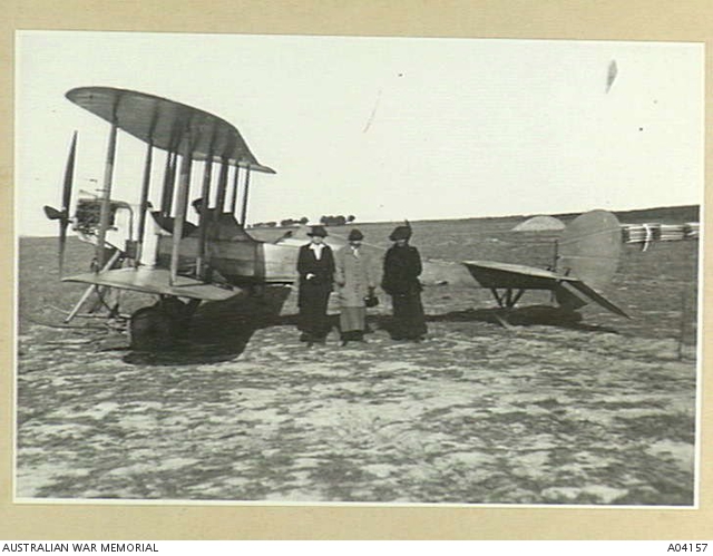 Lady Bridges standing with Babby Bridges and Dorothy next to a BE2a ...