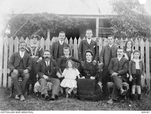 Group portrait of the Worland family in front of a house, probably in ...