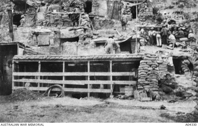 The water supply at Anzac. A hose is coiled in the left foreground and ...