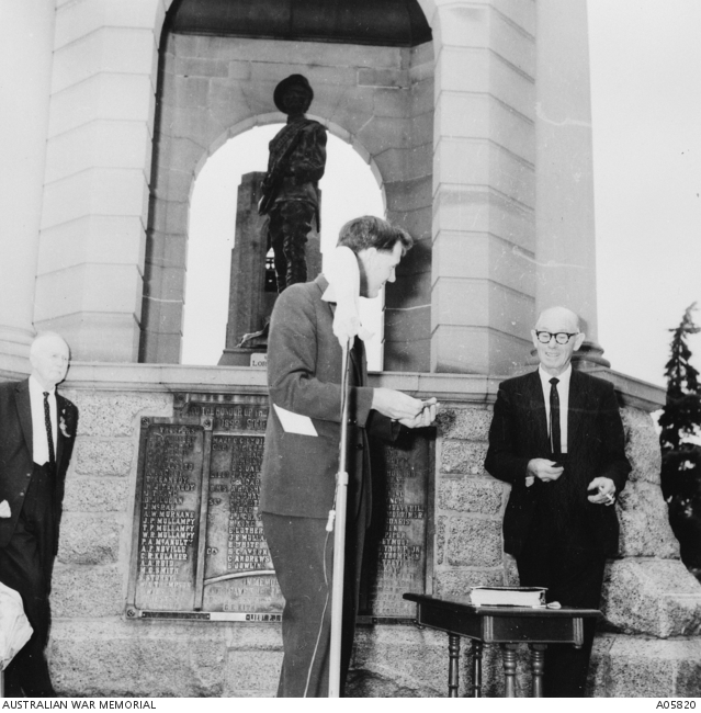 Mr R Osborne, Bathurst Branch RSL President, presents Mr Peter Handcock ...